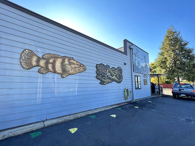 Fish sculptures adorn the exterior walls—a playful preview of the ocean treasures waiting inside this Eugene institution.