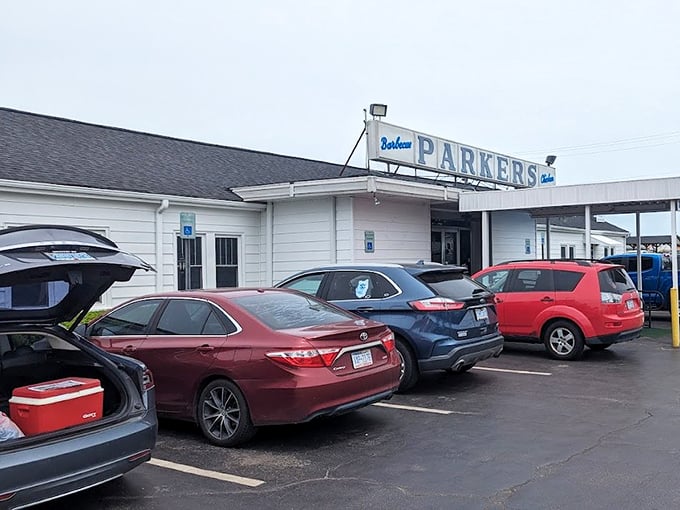 A parking lot that fills with license plates from across the state. The real North Carolina unity isn't political—it's the willingness to drive for exceptional barbecue.