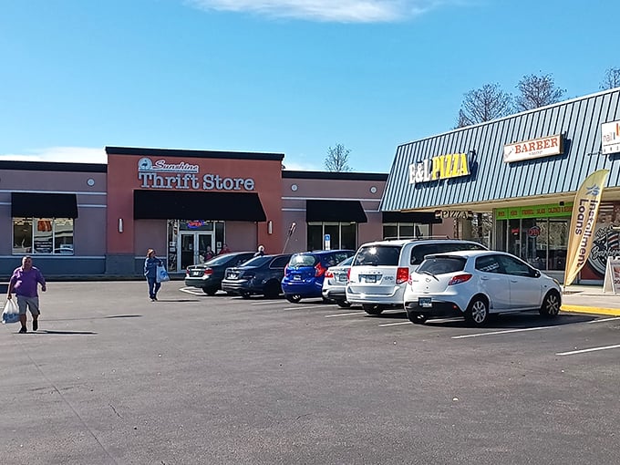 Even the parking lot tells a story—Sunshine Thrift nestled in a strip mall, neighbors with a pizza joint, because treasure hunting works up an appetite!