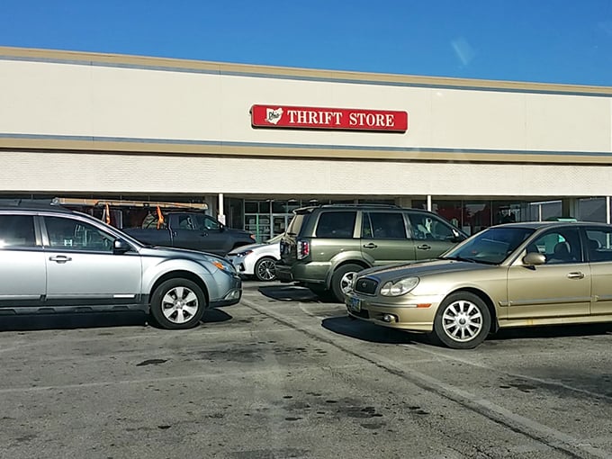 The parking lot tells its own story—a mix of vehicles from practical to luxury. Thrifting transcends economic boundaries; everyone loves a great find.