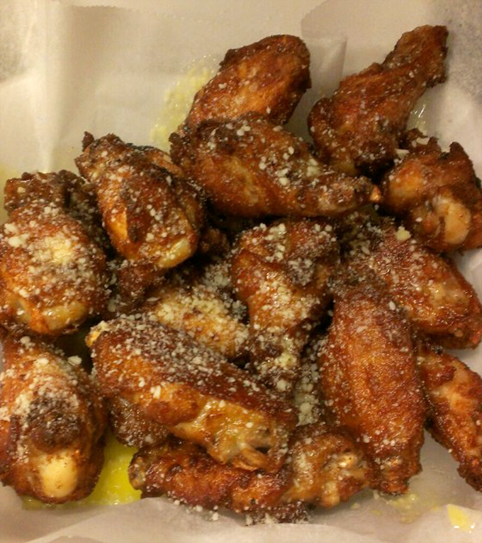 Parmesan garlic wings that don't need a fancy introduction—they let their golden, crispy, cheese-dusted perfection do all the talking.