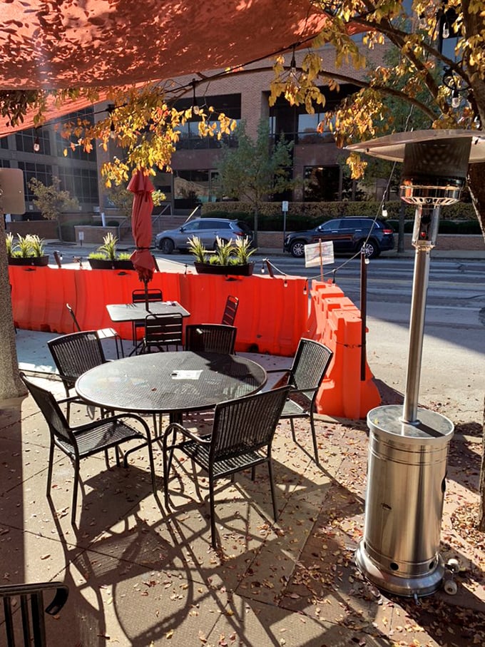 The outdoor patio offers a perfect urban oasis—where fall leaves and heaters create that magical setting for enjoying your burger with a side of people-watching.