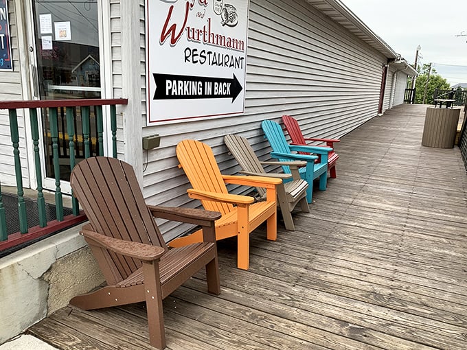 Colorful Adirondack chairs offer a place to contemplate life's big questions—like whether to order coconut cream or butterscotch pie.