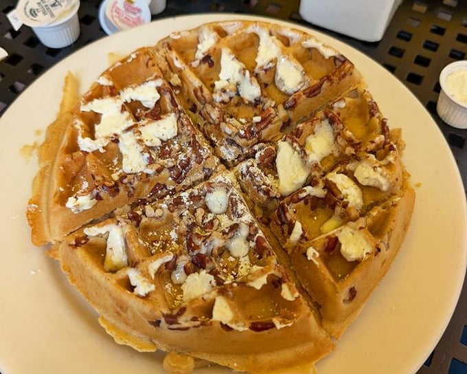 These waffles don't just have pecans and bacon—they've created a breakfast utopia where sweet and savory live in perfect harmony.