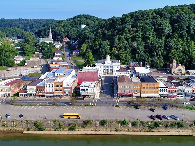 From above, Pomeroy reveals its unique "skinny city" layout. One street hugging the river, with hills rising dramatically behind—a town literally shaped by geography.