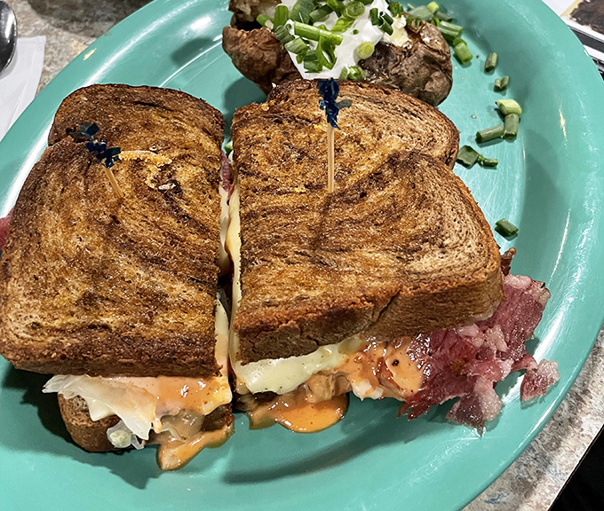 A proper Reuben should require both hands and several napkins. This beauty, with its melty cheese and grilled rye, delivers on that promise.