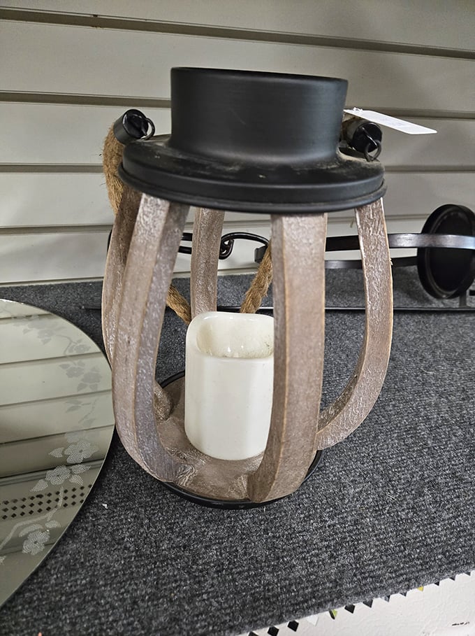 This rustic lantern doesn't just illuminate spaces—it creates ambiance for those "electricity went out but we're still fancy" moments.