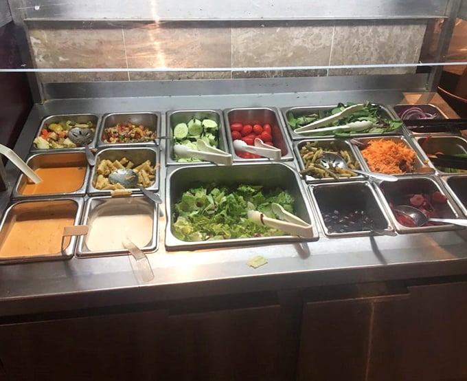 Fresh ingredients lined up like soldiers ready for duty – the unsung heroes behind every crisp salad and vibrant garnish.