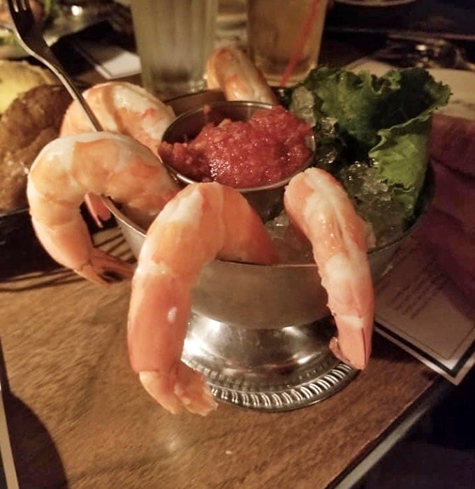 Shrimp cocktail: the classic appetizer that never goes out of style. These plump beauties are practically doing a victory lap around that sauce.
