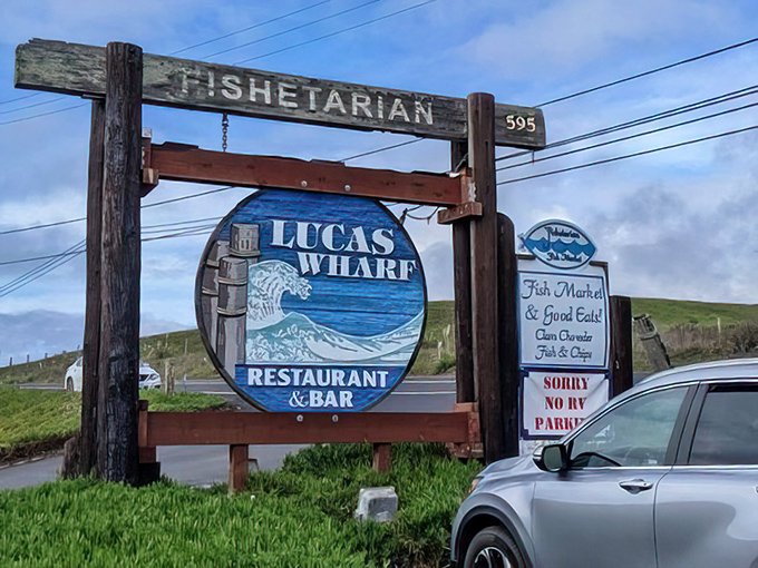 The roadside sign that's launched a thousand detours – because sometimes the best dining decisions happen when you're willing to follow a wooden fish.
