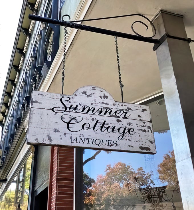 The sign says "Summer Cottage Antiques," but it might as well read "Abandon all willpower, ye who enter here."