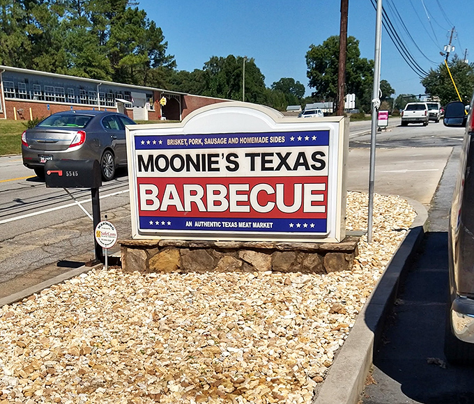 The sign promises "authentic Texas meat market" – a bold claim in Georgia that's backed up by every smoke-infused bite inside.