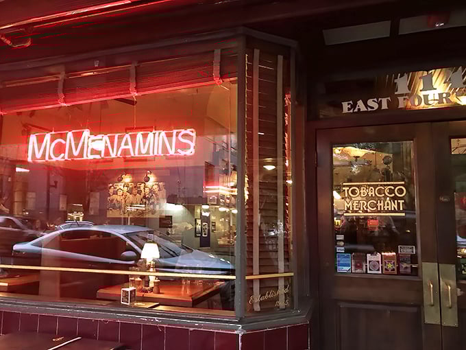 As night falls, the neon signs transform from mere signage to a siren call for those seeking good food, drinks, and company.