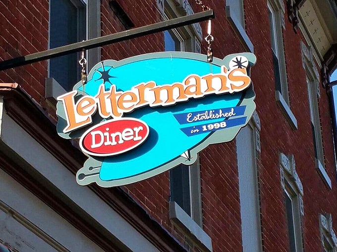The iconic blue sign swinging above Kutztown's sidewalk—a beacon of hope for the hungry and a landmark for those in the know.