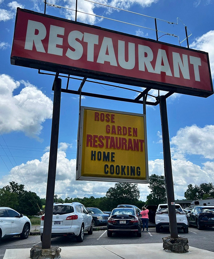 The roadside sign proclaiming "HOME COOKING" isn't just advertising – it's a promise kept with every plate that leaves the kitchen.