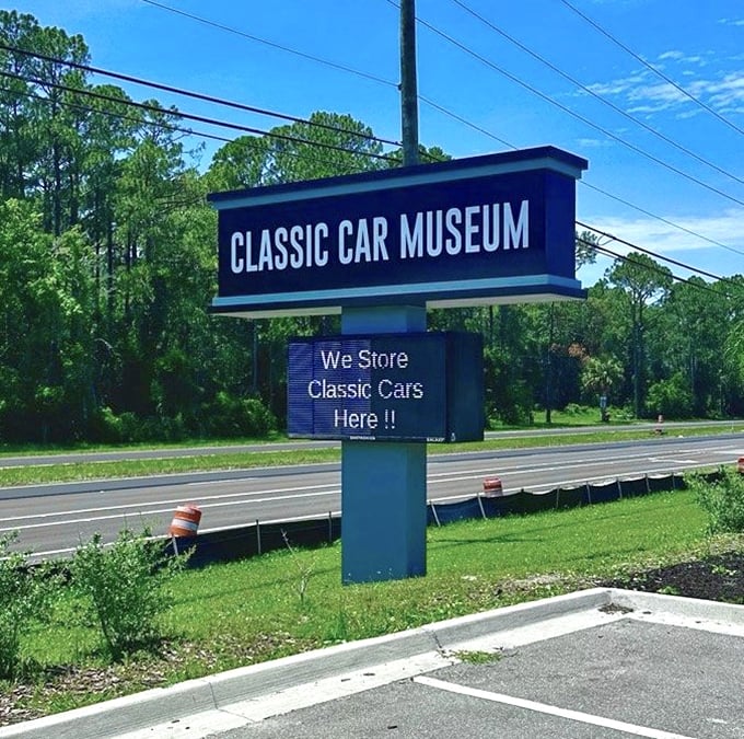 "We Store Classic Cars Here!!" might be the most honest museum signage ever. No fancy marketing needed when your collection speaks for itself.