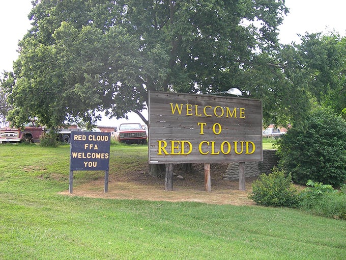 Welcome signs like these aren't just wood and paint—they're the first handshake from a town eager to show you its best self.