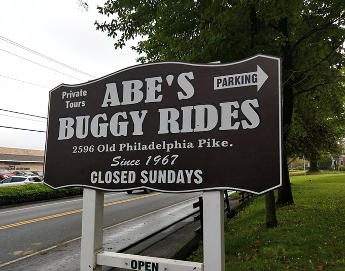 Since 1967, this unassuming sign has welcomed visitors seeking a glimpse into a simpler way of life. Closed Sundays, naturally.