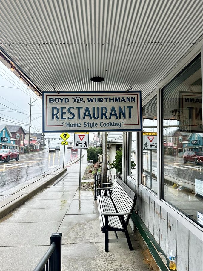Even on rainy days, the Boyd & Wurthmann sign promises shelter from both the weather and the complicated world beyond its simple, welcoming doors.