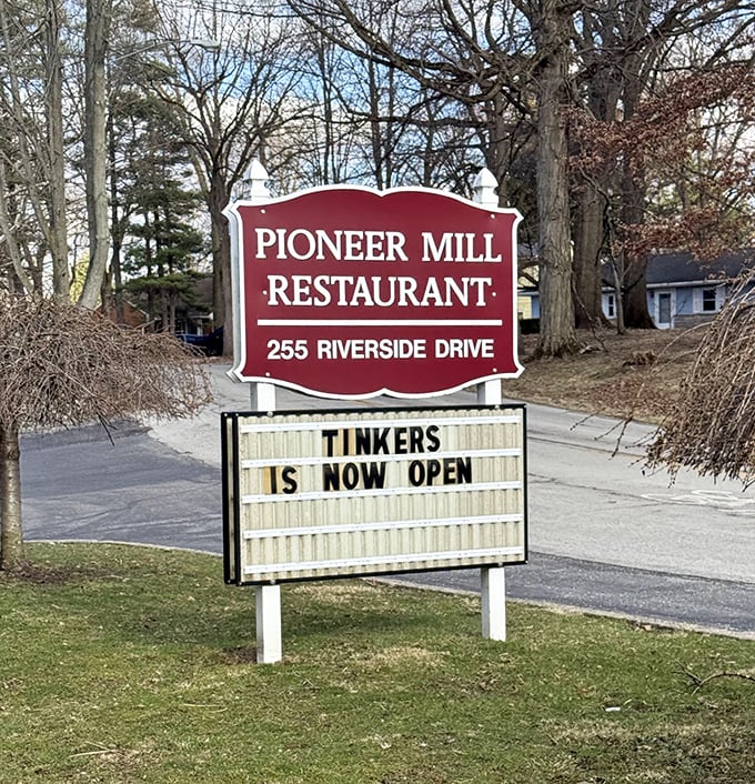Located at 255 Riverside Drive, the Pioneer Mill's roadside sign stands as a beacon for hungry travelers seeking authentic Ohio dining.
