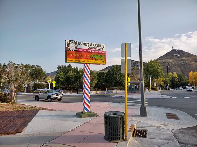 The roadside sign stands like a beacon of breakfast hope against Salida's mountain skyline, guiding hungry travelers to their biscuit destiny.