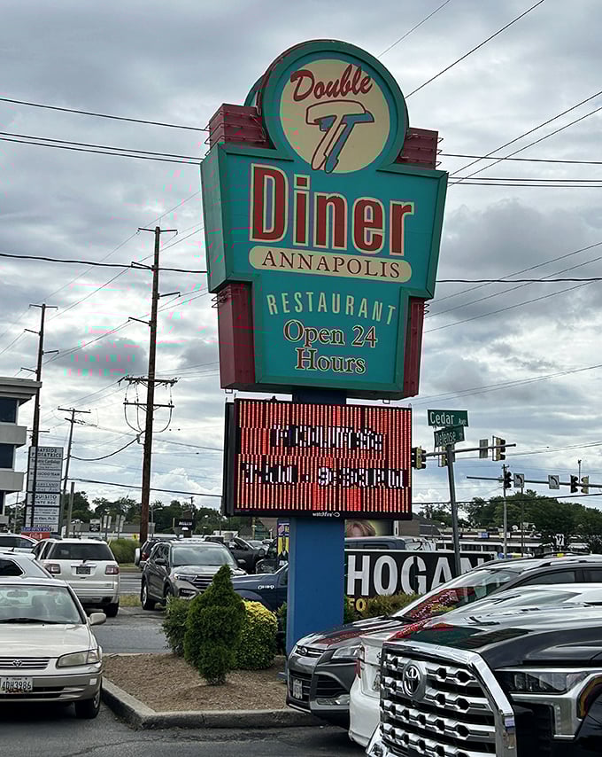 The beacon of hope for hungry travelers and night owls alike: that glorious 24-hour sign promising pancakes are possible at any hour.