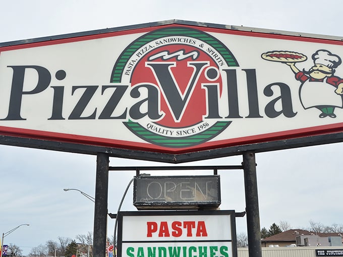 The sign says it all – "Quality Since 1956" isn't just a slogan; it's a promise that's been kept through generations of pizza lovers.