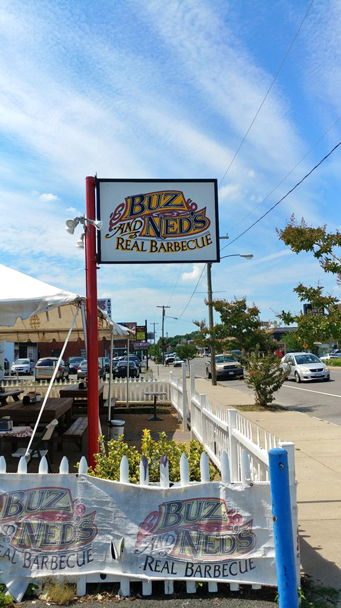 The sign stands like a beacon of hope for the hungry. "Real Barbecue" isn't just a name—it's a solemn promise to your taste buds.