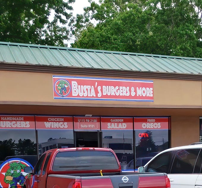 That green burger hero on the sign isn't just a mascot—he's a promise that inside awaits a meal of heroic proportions.