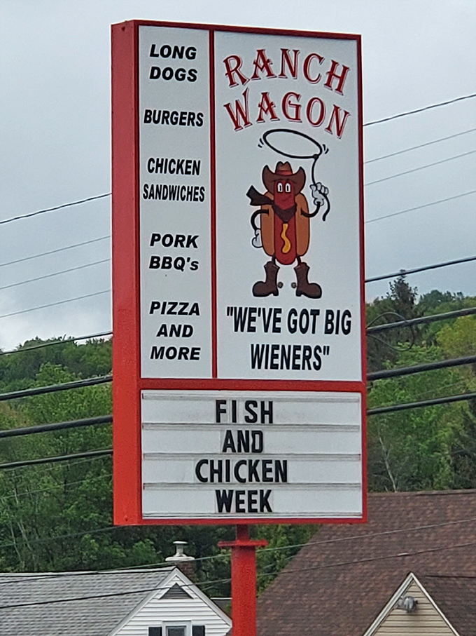 "We've Got Big Wieners"—a sign that proves great food and dad jokes have peacefully coexisted in Pennsylvania for decades. Fish and Chicken Week is just a bonus.