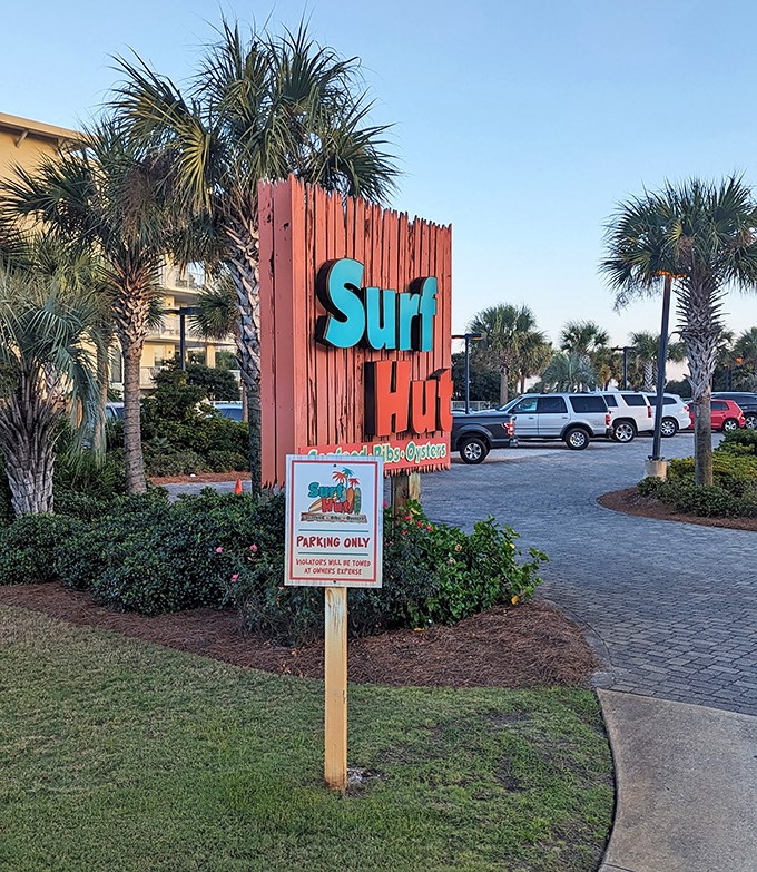 Even the parking sign looks happy to be here – a final reminder that at Surf Hut, even the practical details have beach vibes.