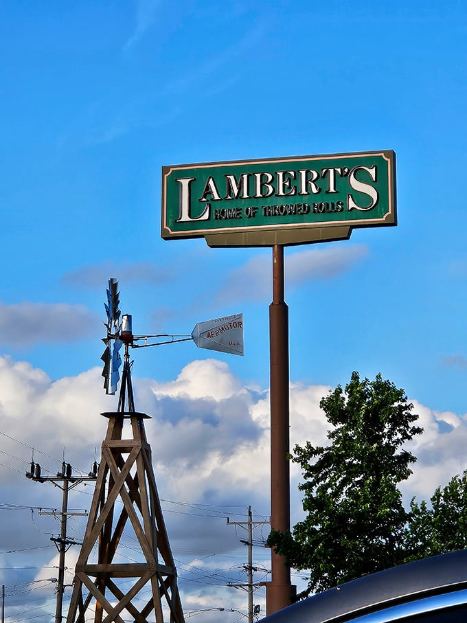 The iconic Lambert's sign against a Missouri sky—a beacon for hungry travelers and a landmark that promises more than just a meal.