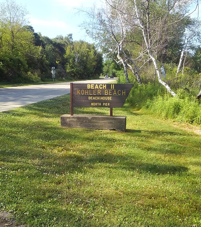Beach 11's sign welcomes visitors to their sandy destiny – Kohler Beach, where memories are mandatory.