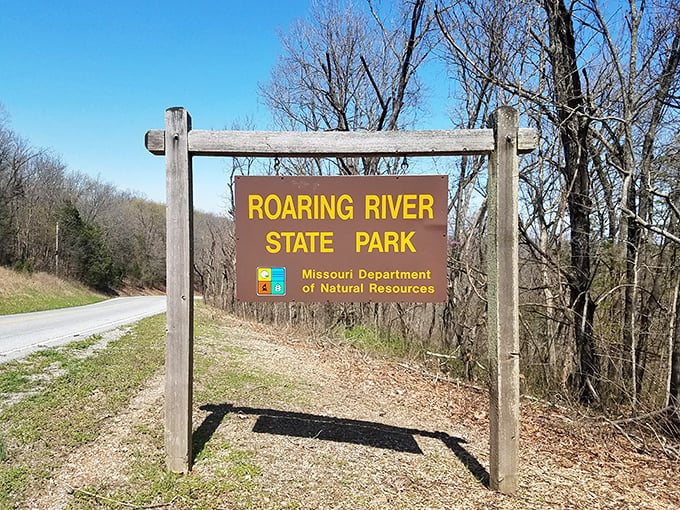 Your first clue that something special awaits – the unassuming entrance sign stands as a humble gatekeeper to one of Missouri's most breathtaking natural treasures.