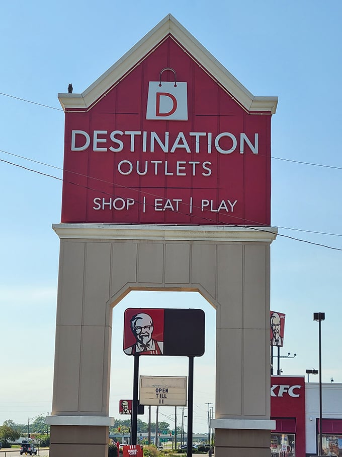 The gateway to bargain paradise! This iconic red sign doesn't just mark an entrance—it signals the beginning of a beautiful shopping friendship.