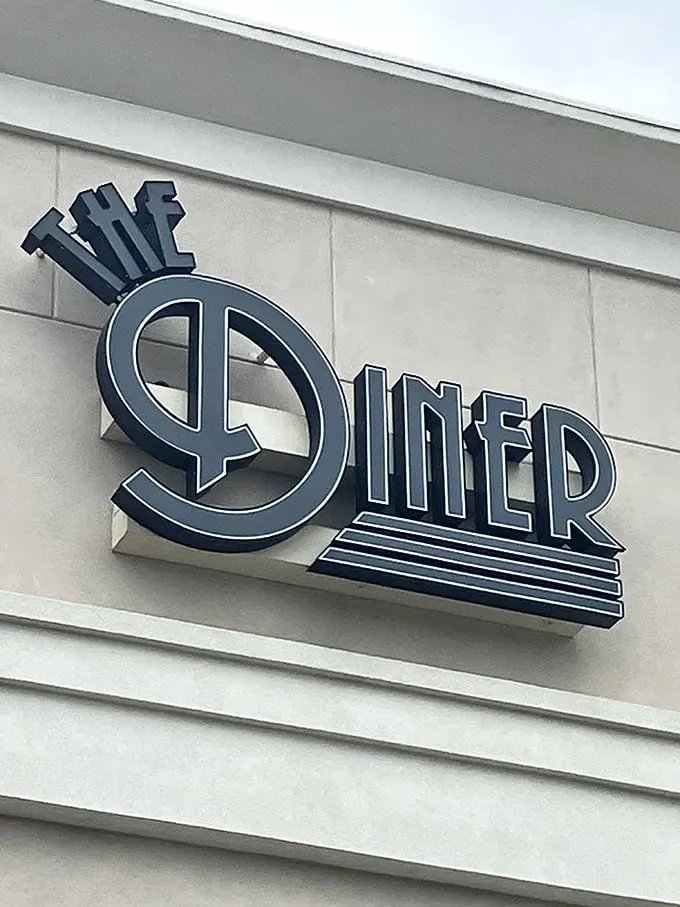The iconic signage that has become a landmark for hungry travelers and locals alike—a symbol of culinary comfort in the heart of Tyler.