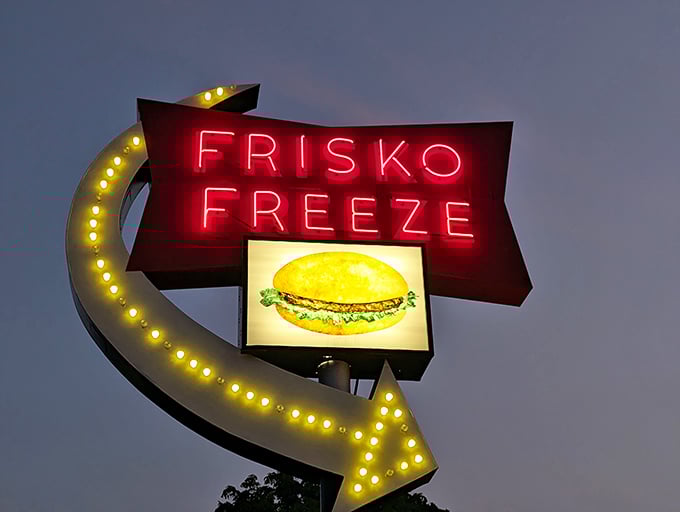 That sign isn't just advertising - it's a beloved landmark that's been photobombing Tacoma family pictures for generations.