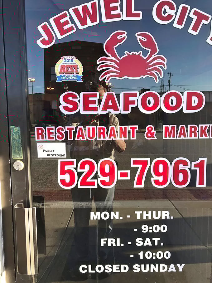 The door tells you everything you need to know—when to come, what to expect, and that coveted "Best of Huntington" award that locals already knew they deserved.