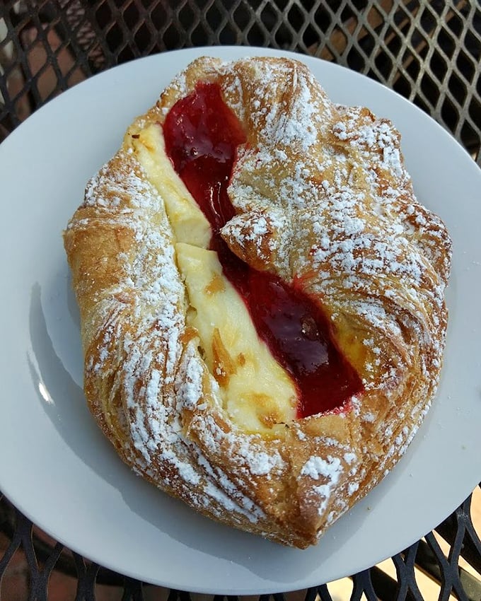 This strawberry cheese Danish is what happens when pastry chefs dream—flaky exterior, creamy cheese filling, and that ruby-red fruit center playing the starring role in this breakfast drama.