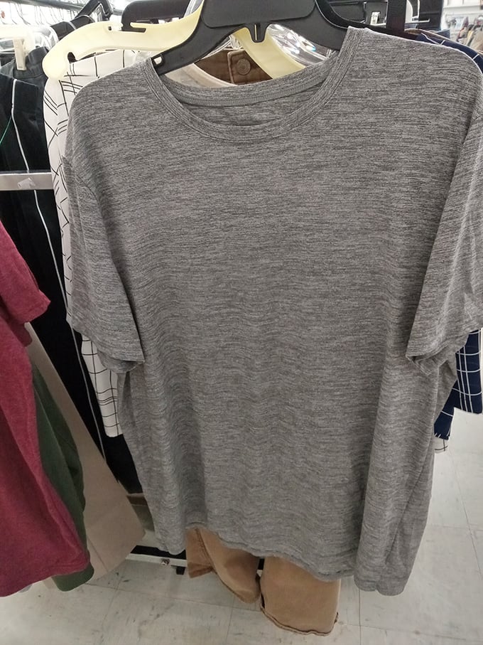 The humble gray t-shirt—fashion's equivalent of a blank canvas—waiting for someone to pair it with vintage jeans and ironic confidence.