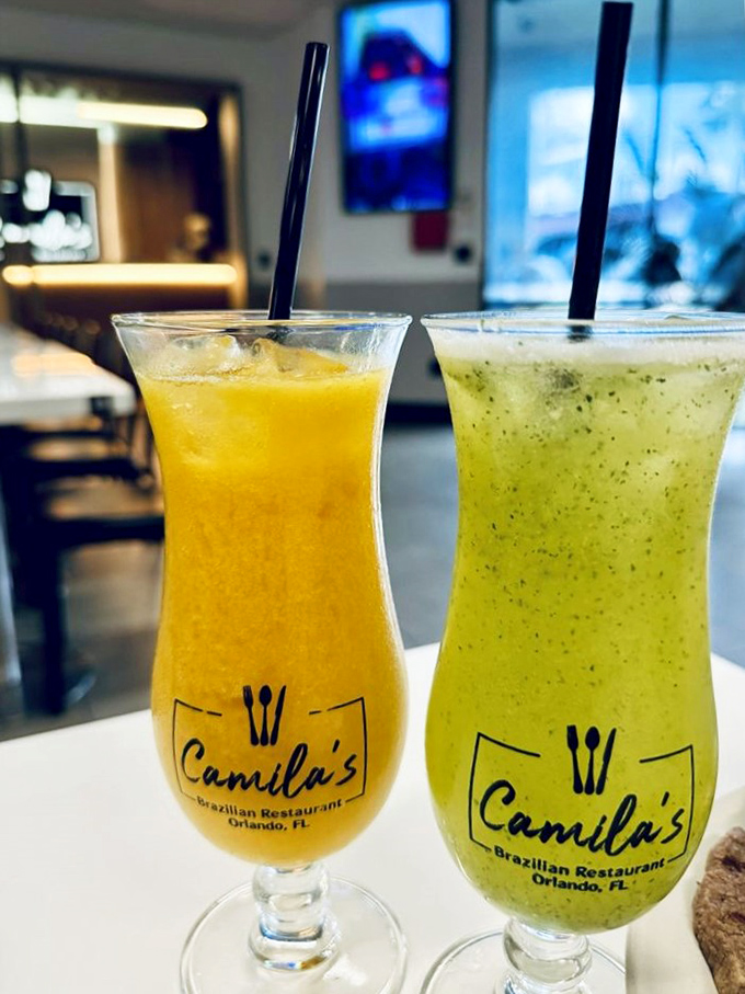 Tropical fruit smoothies in signature glasses—liquid sunshine that cleanses the palate between bites of savory churrasco perfection.