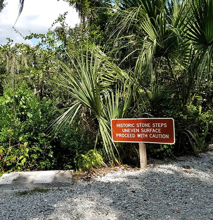 This warning sign might as well read "History Ahead" – those uneven surfaces are just part of the authentic experience of stepping back in time.