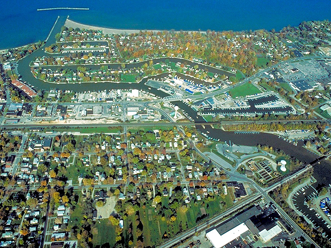 From above, Vermilion's perfect planning reveals itself—neighborhoods nestled around the harbor like a community embracing its watery heart.