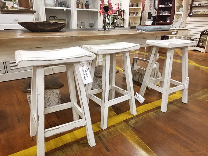 Bar stools with the perfect amount of distressing—like jeans that come pre-worn, except these earned their character honestly through decades of supporting humanity.