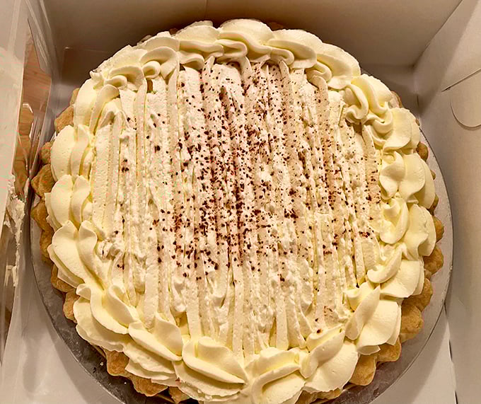 This banana cream pie doesn't just end a meal—it's the grand finale that makes you want to start a standing ovation right in the middle of the restaurant.