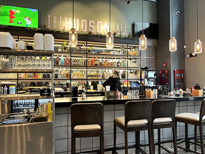 The bar area gleams with promise—where morning mimosas and Bloody Marys transform ordinary breakfasts into weekend celebrations.