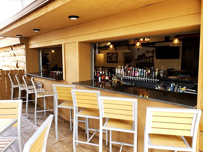 The indoor-outdoor bar blurs the line between cocktail hour and lakeside relaxation—summer in Wisconsin distilled into architectural form.