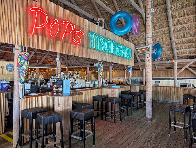 The tiki bar at Pop's doesn't just serve drinks—it serves an escape from reality with a side of neon-lit tropical vibes.