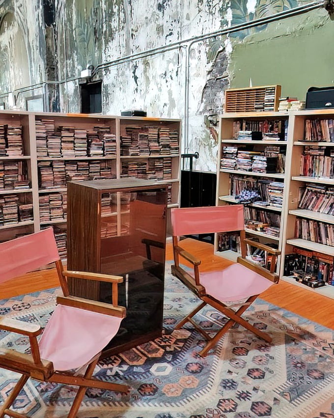 Director's chairs face shelves of books in this literary corner—the perfect spot to contemplate which stories deserve a second life in your home.