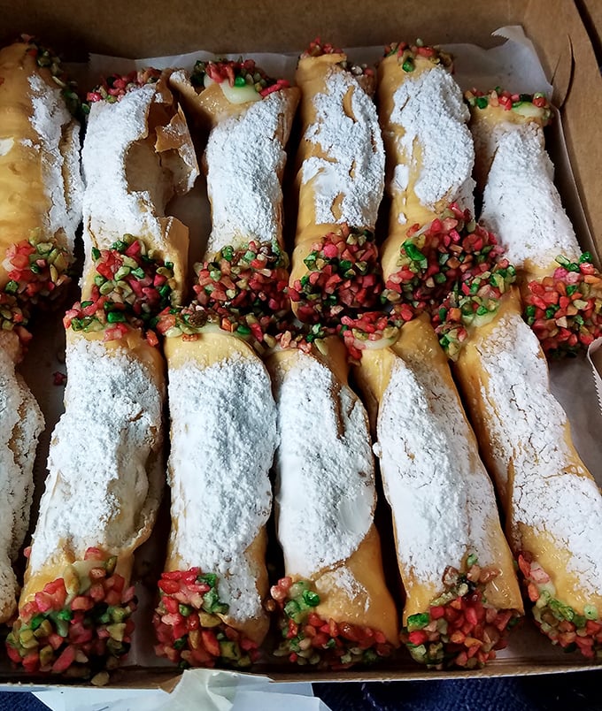 Cannoli that could make a Sicilian weep – crisp shells, creamy filling, and festive sprinkles creating the holy trinity of dessert.